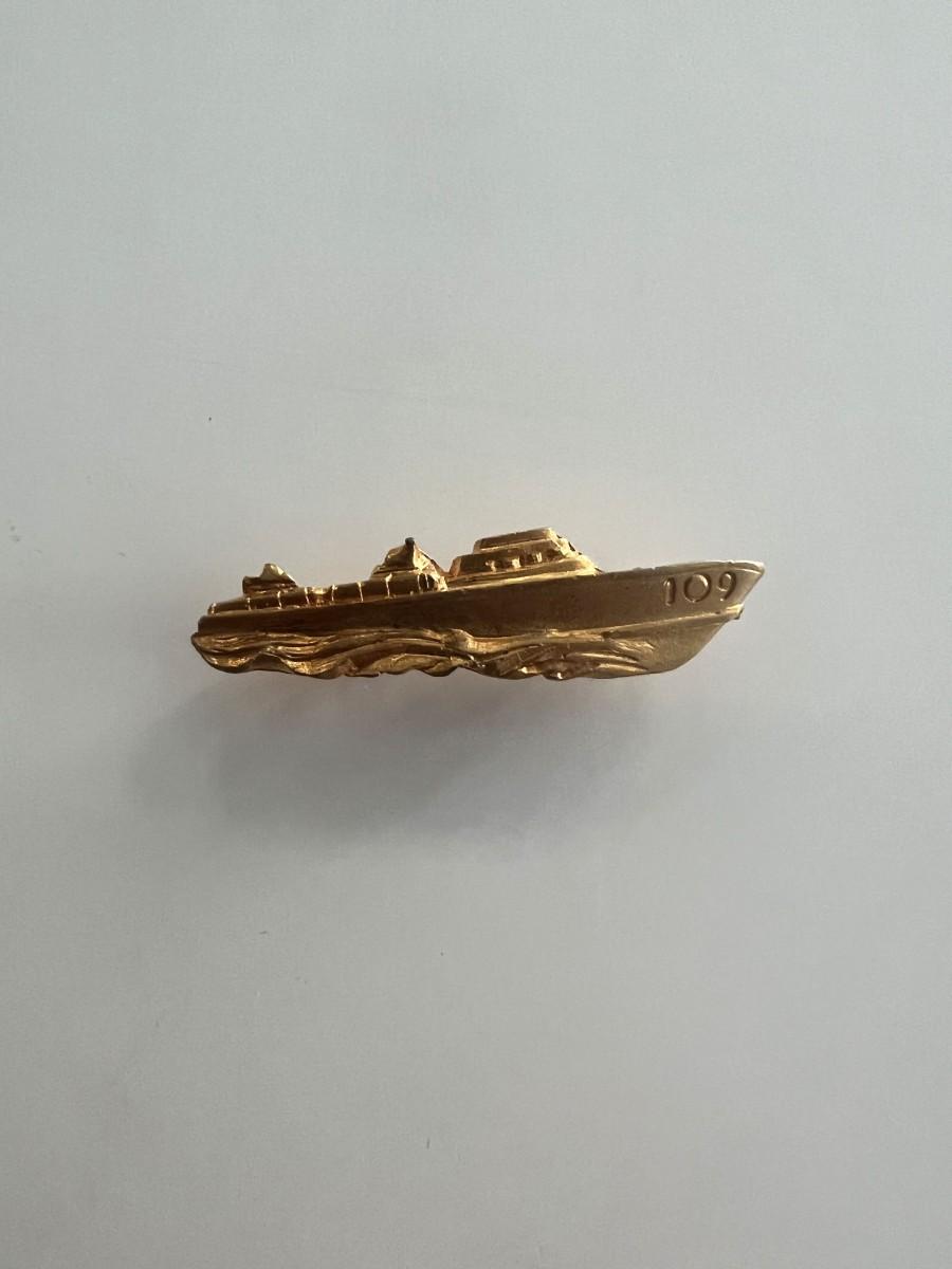 PT-109 lapel pin | EstateSales.org