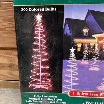 7 FOOT SPIRAL LIGHTED TREE | EstateSales.org