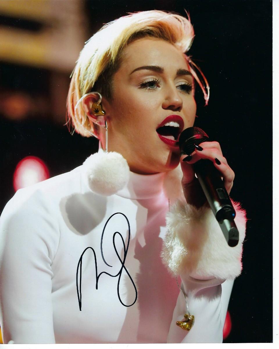 Miley Cyrus signed photo | EstateSales.org