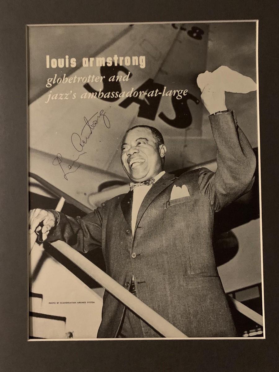 Louis Armstrong signed magazine photo | EstateSales.org