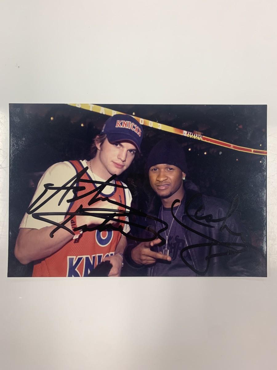Ashton Kutcher and Usher signed photo | EstateSales.org