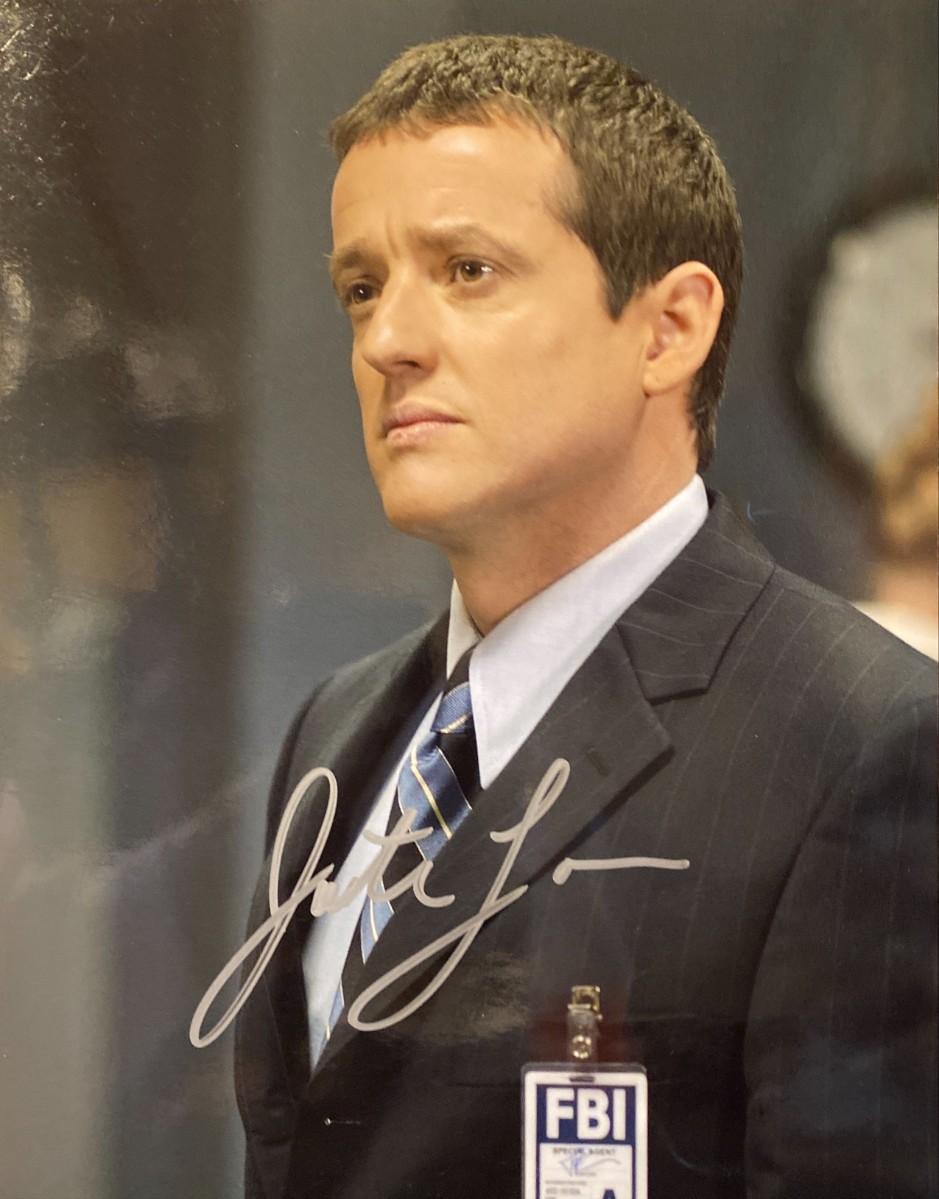 Justin Louis signed photo | EstateSales.org