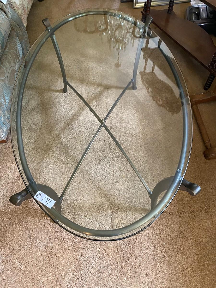 Oval Heavy 1/4" Glass Coffee Table on Grey Iron Frame | EstateSales.org
