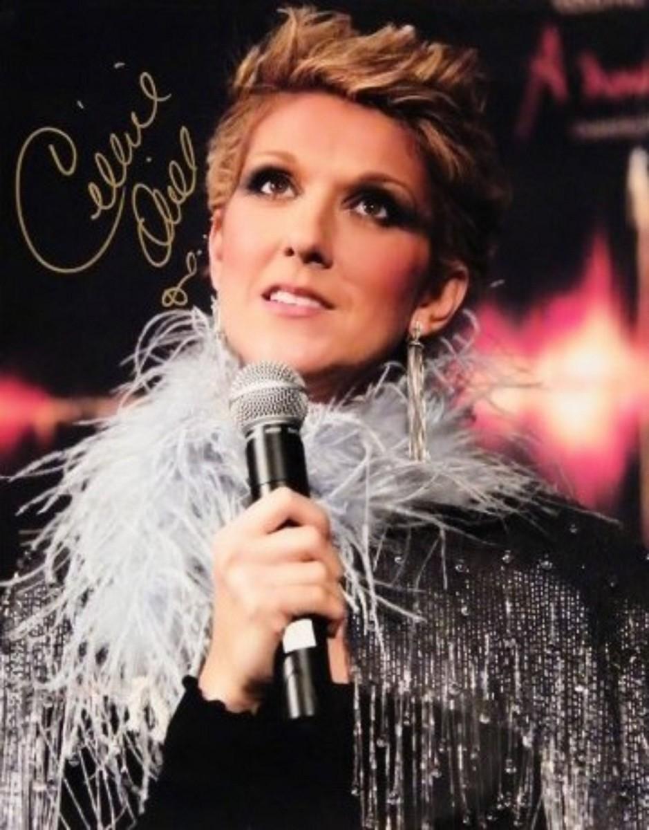 Celine Dion signed promo photo | EstateSales.org