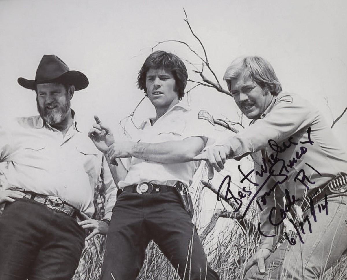 Code R Tom Simcox signed photo | EstateSales.org