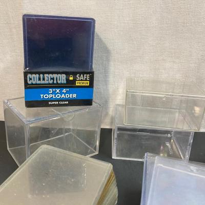 LOT 51: Trading Card Protectors | EstateSales.org