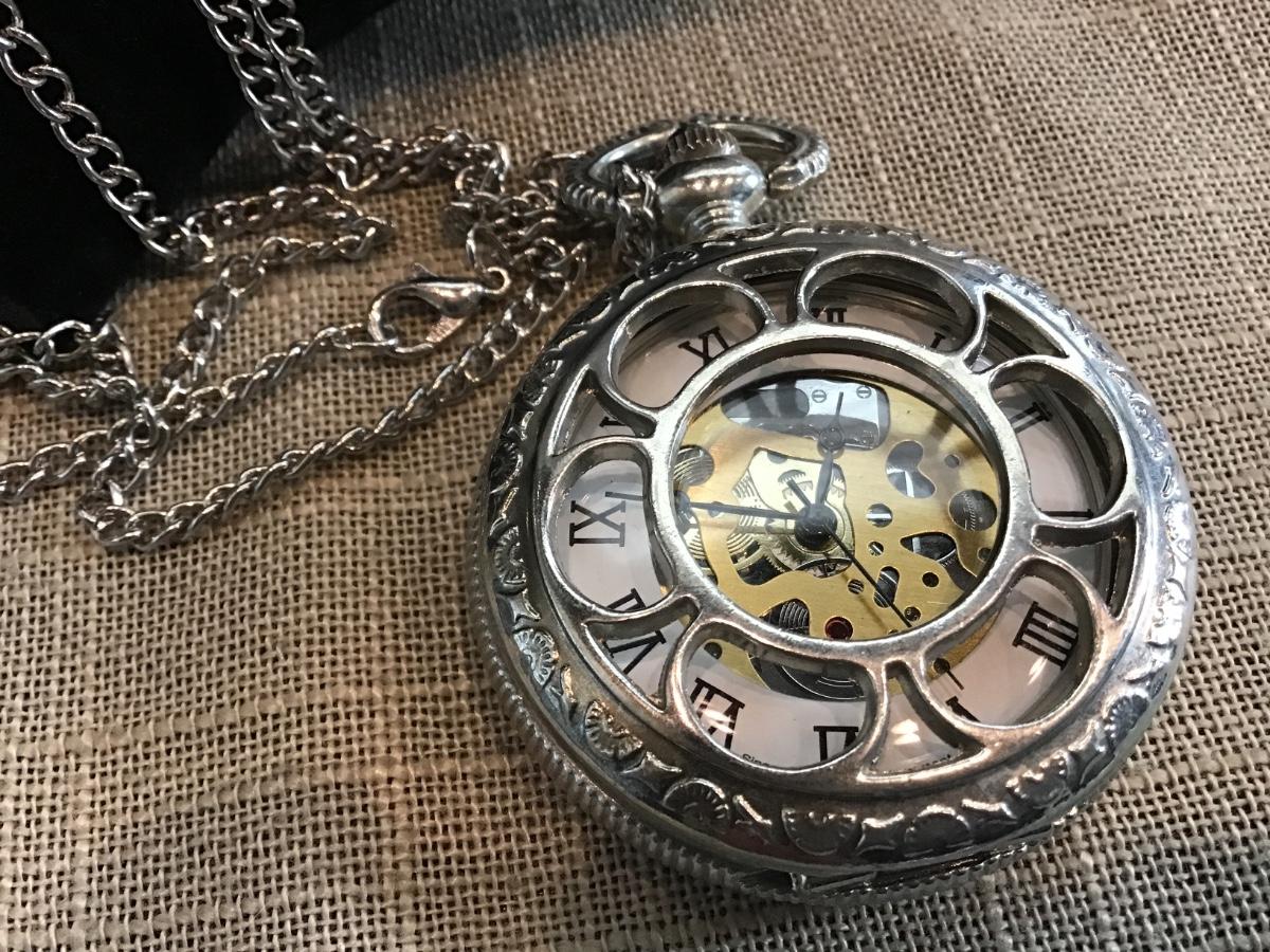 Pocket Watch on Chain | EstateSales.org
