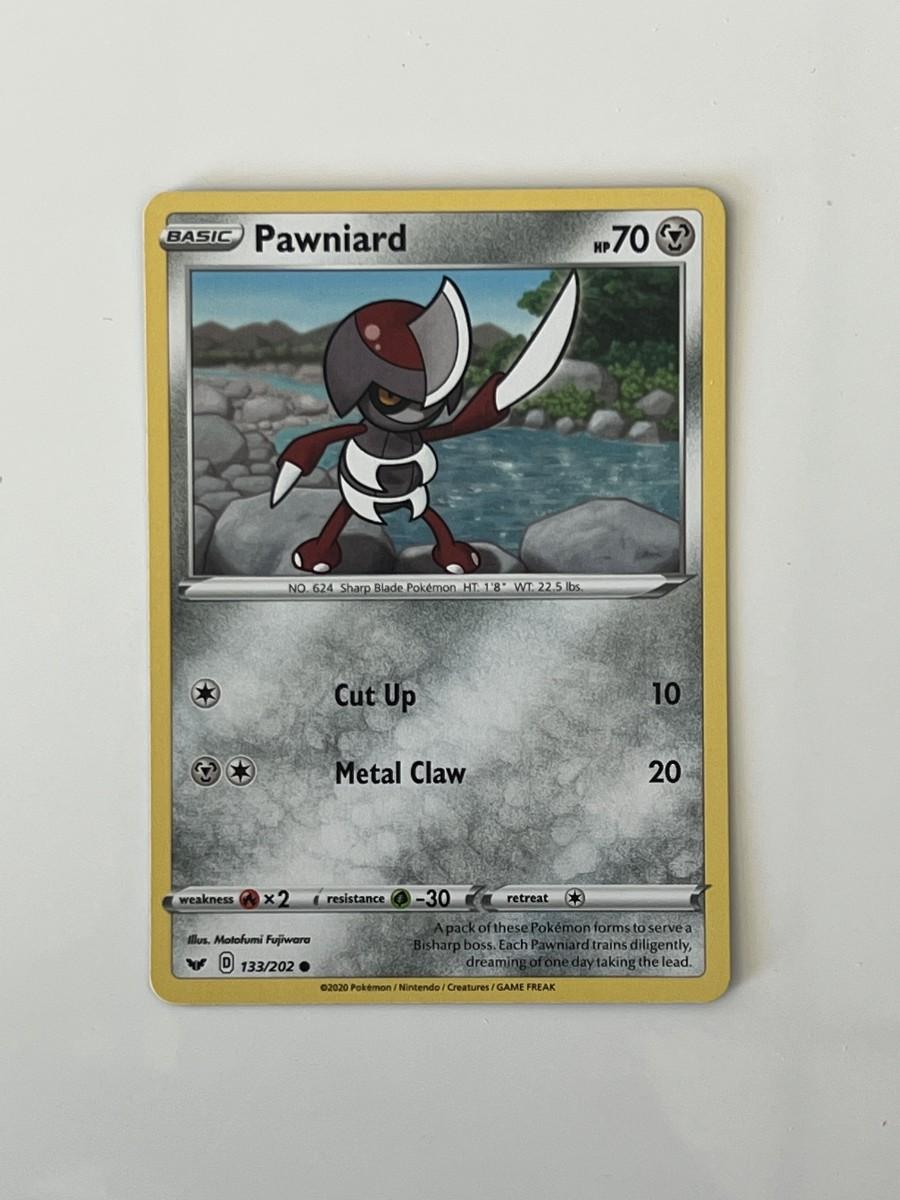 Pawniard Pokemon Card Mint Plus | EstateSales.org