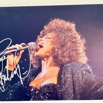 Whitney Houston signed photo | EstateSales.org