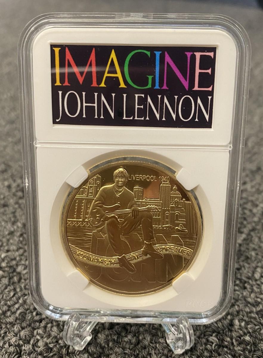 Imagine John Lennon commemorative coin | EstateSales.org