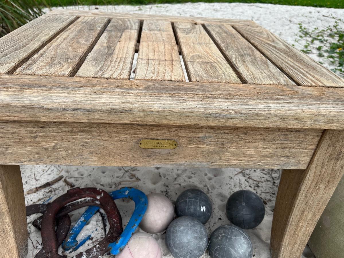 Small teak outdoor table | EstateSales.org