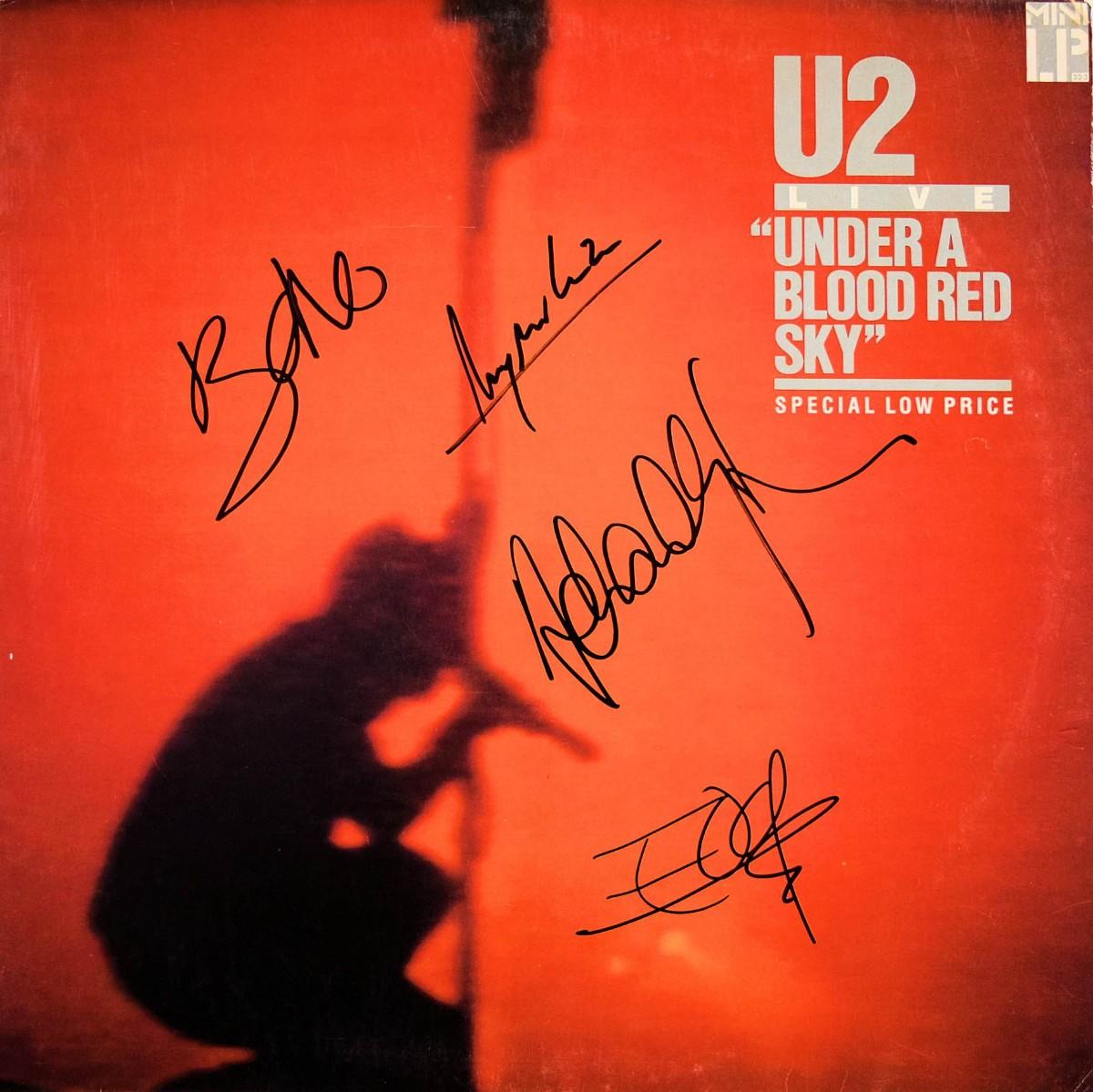 U2 Under A Blood Red Sky signed album | EstateSales.org