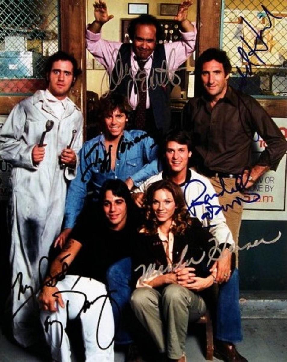 Taxi cast signed photo | EstateSales.org