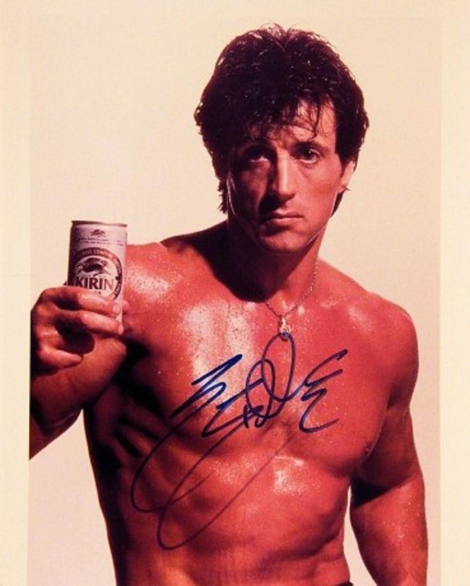 Sylvester Stallone signed movie photo | EstateSales.org