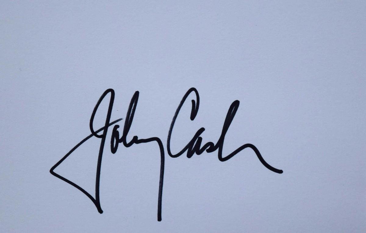 Johnny Cash signature slip | EstateSales.org