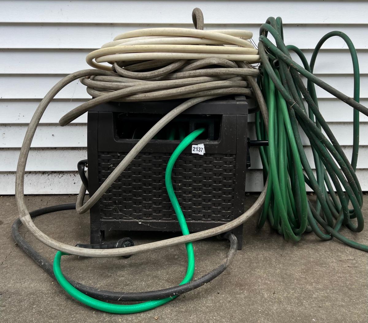 Assorted hoses and hose box | EstateSales.org