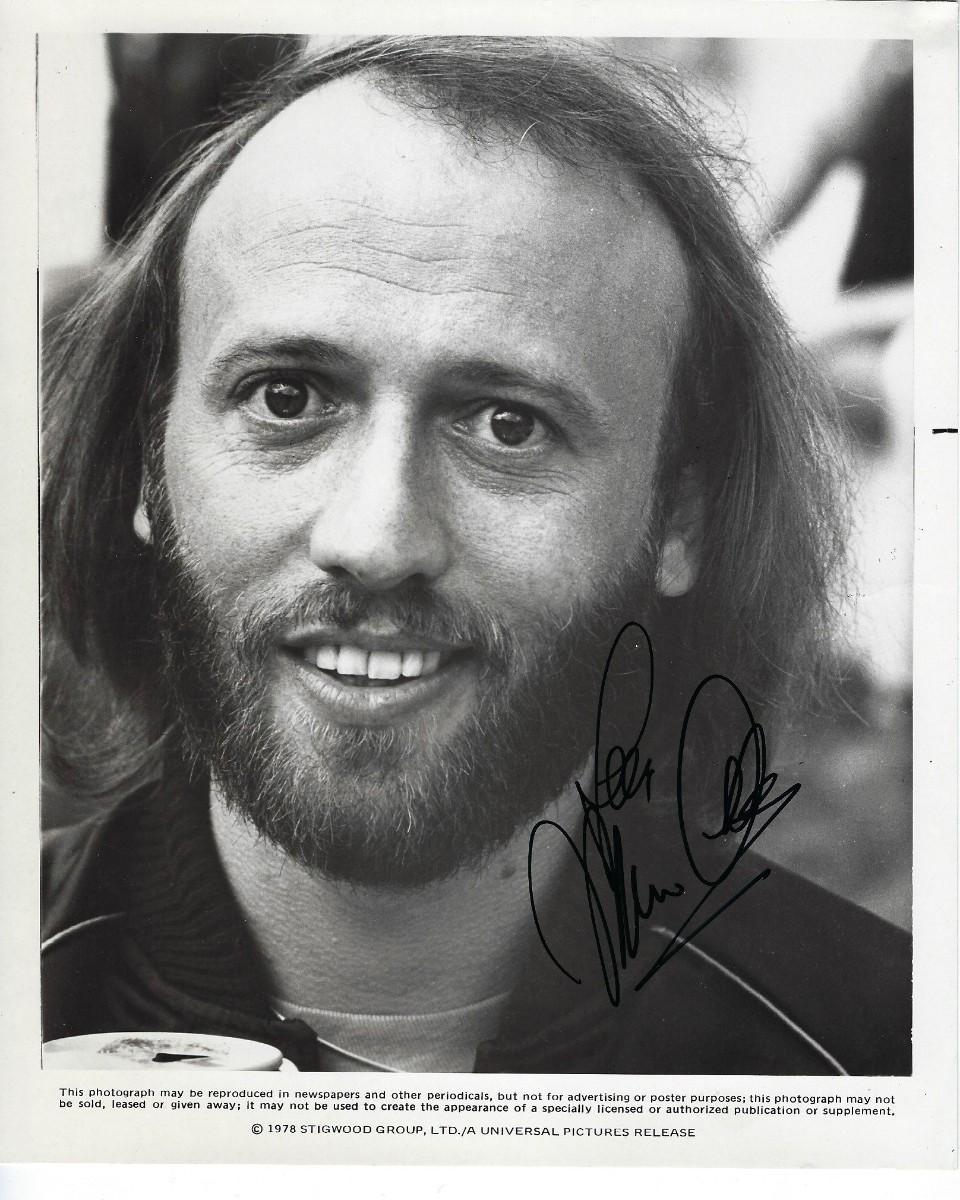 Maurice Gibb signed Bee Gees photo | EstateSales.org