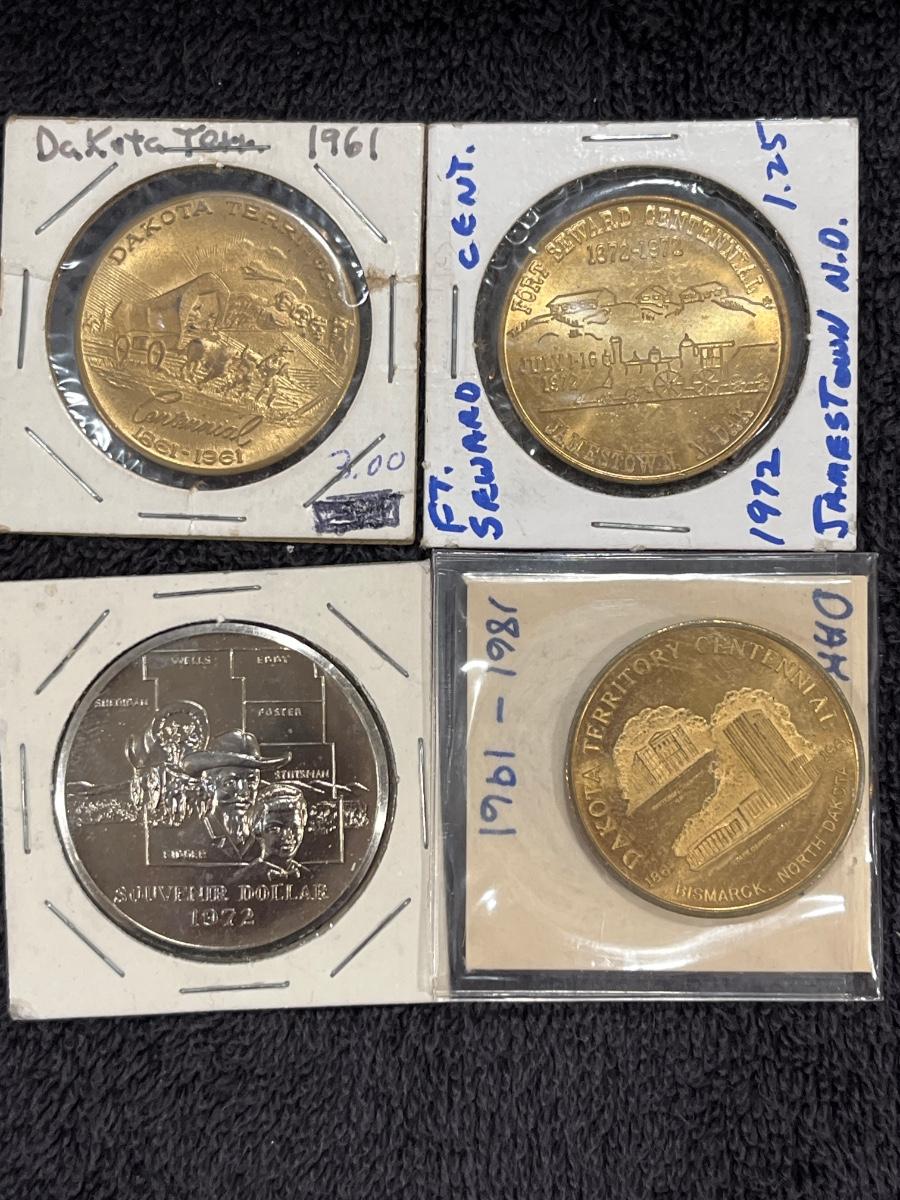 4 State Of North Dakota Tokens | EstateSales.org
