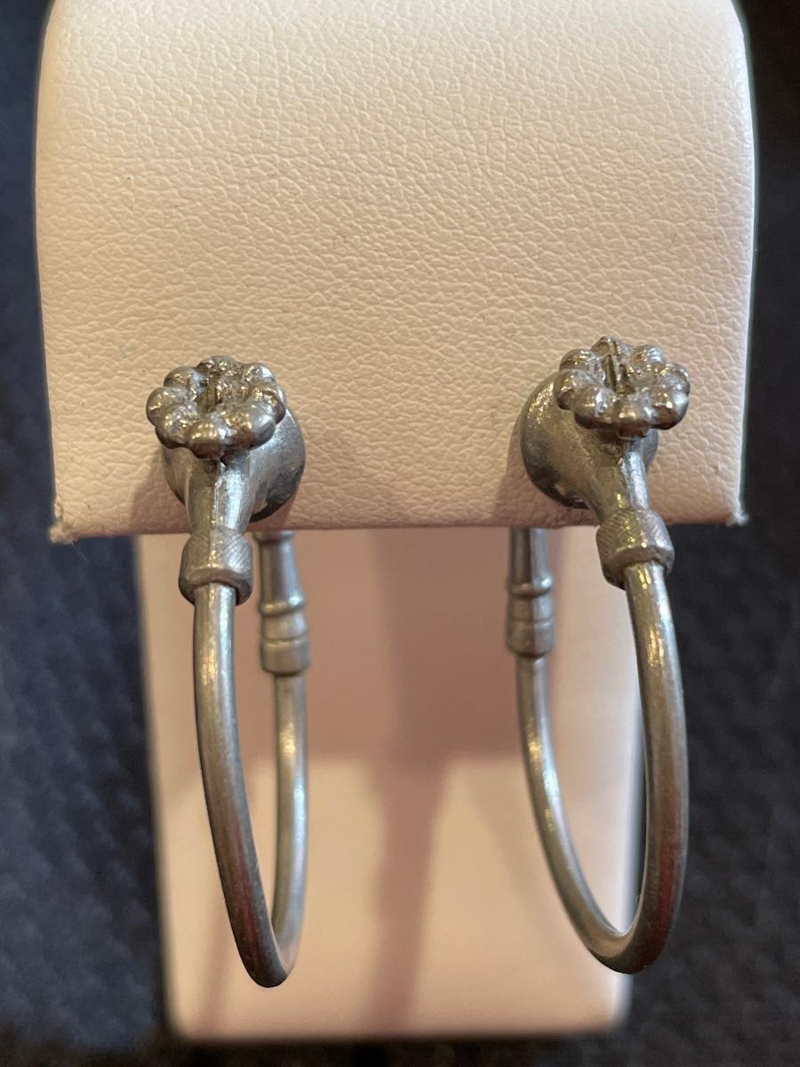 Water Spicket earrings | EstateSales.org