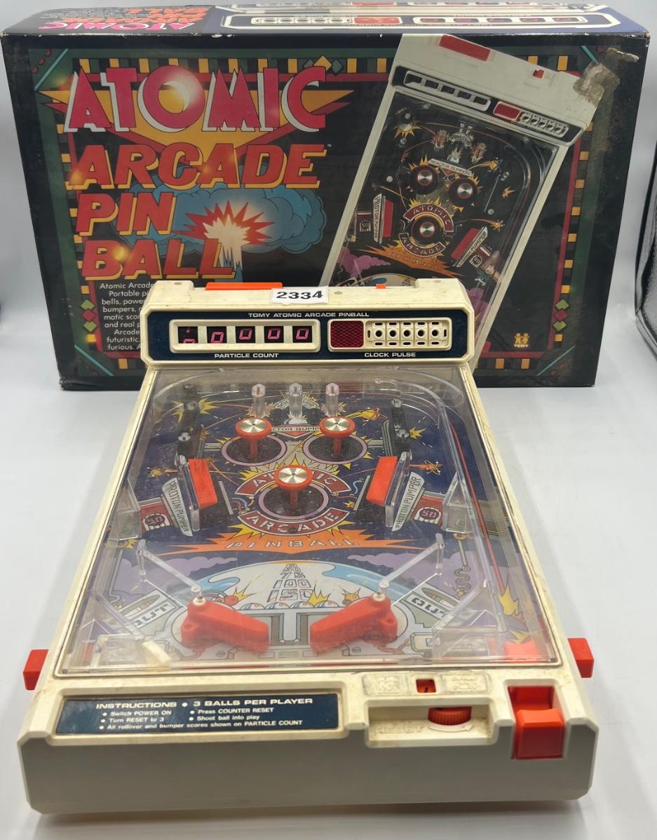 Atomic arcade pin ball | EstateSales.org