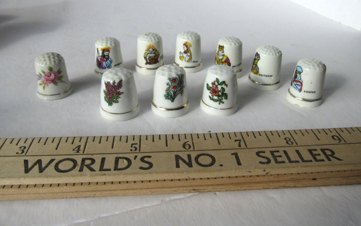 Lot 543: Vintage China Thimble Lot, Nativity, Flowers | EstateSales.org