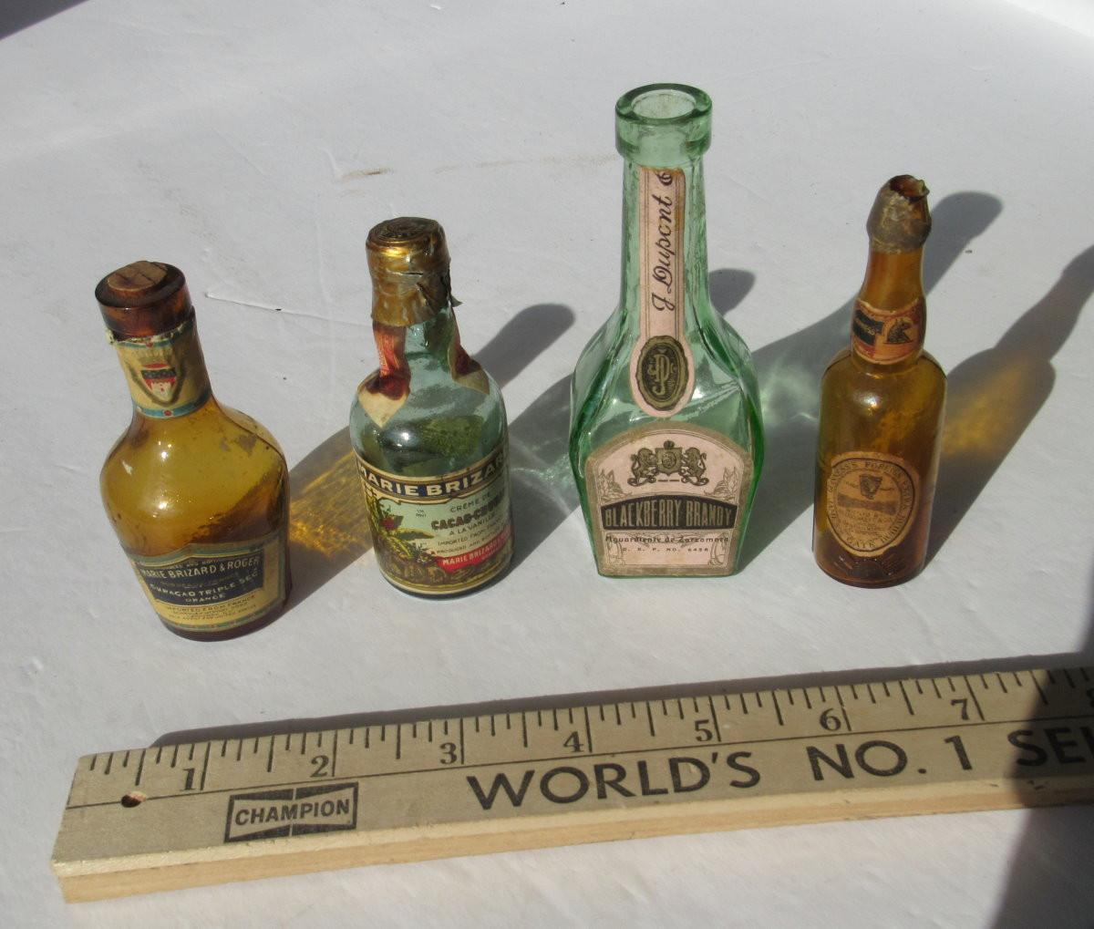 Lot 547: 4 Vintage Miniature Booze Bottles | EstateSales.org