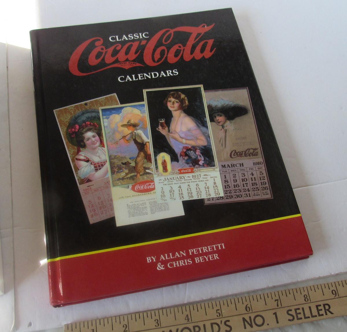 Lot 604: Classic Coca Cola Calendars Book | EstateSales.org