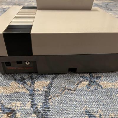 LOT 100C: Vintage Nintendo Console, Controllers And Games | EstateSales.org