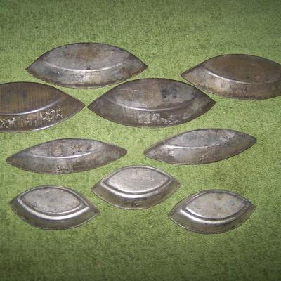 LOT 98 WONDERFUL OLD METAL MOLDS 1898 BREAD MOLD | EstateSales.org