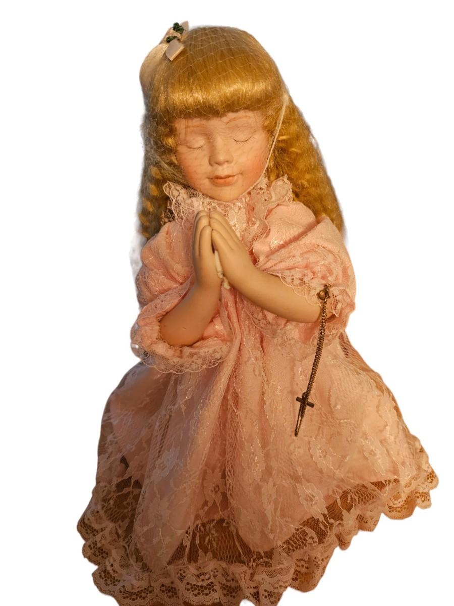 PRAYING DOLL | EstateSales.org