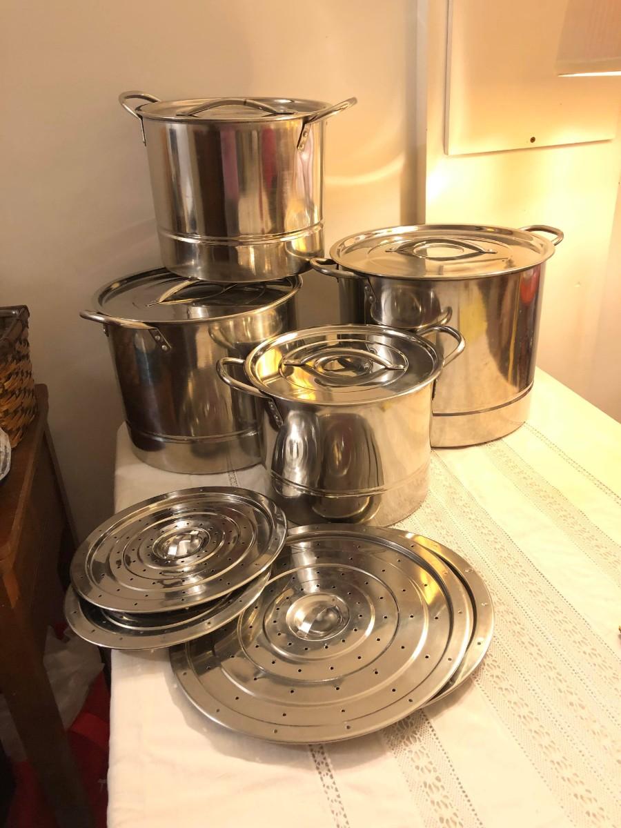 Set of stainless steel stock pots with lids and inserts | EstateSales.org