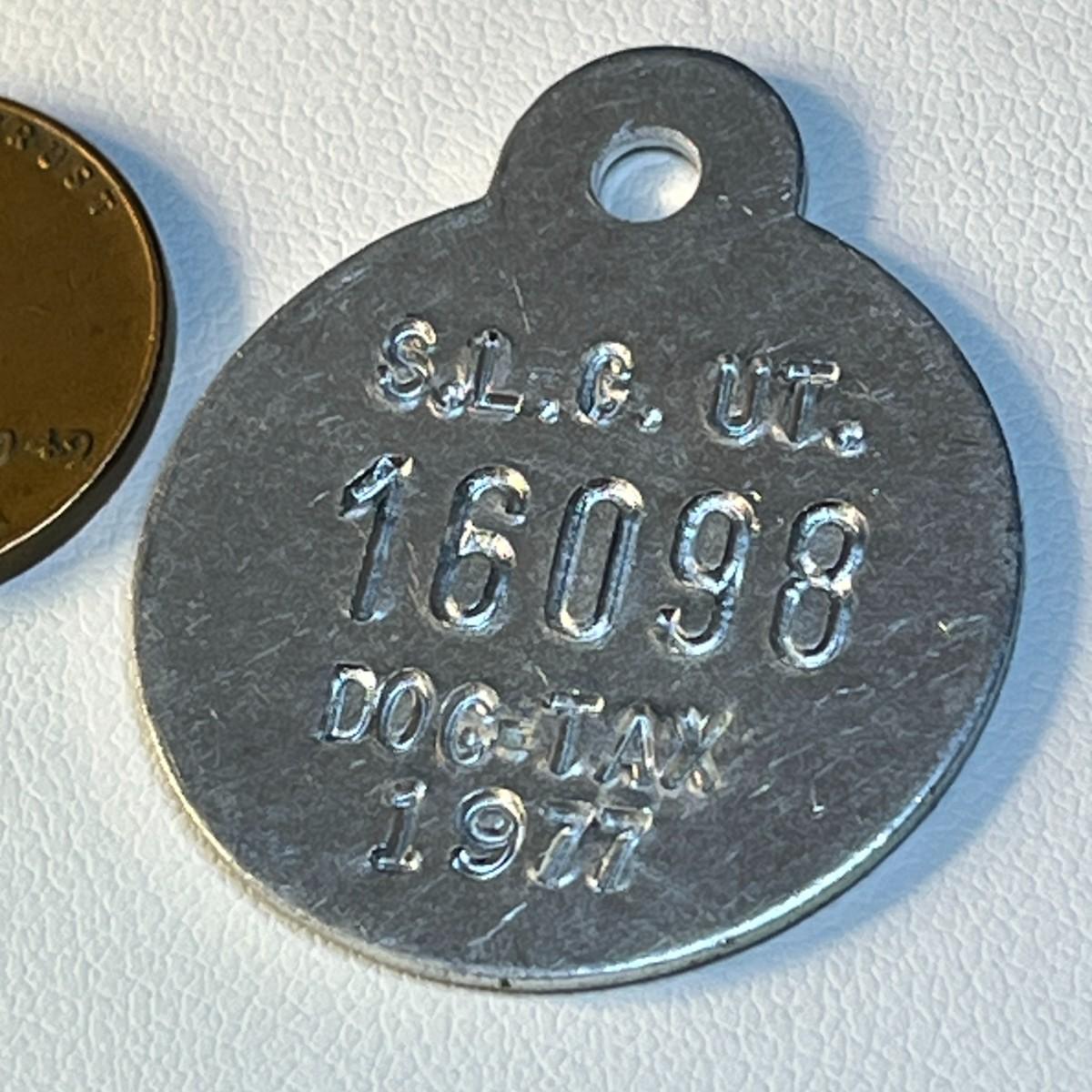 1977 METAL S.L.C. DOG TAX TAG | EstateSales.org