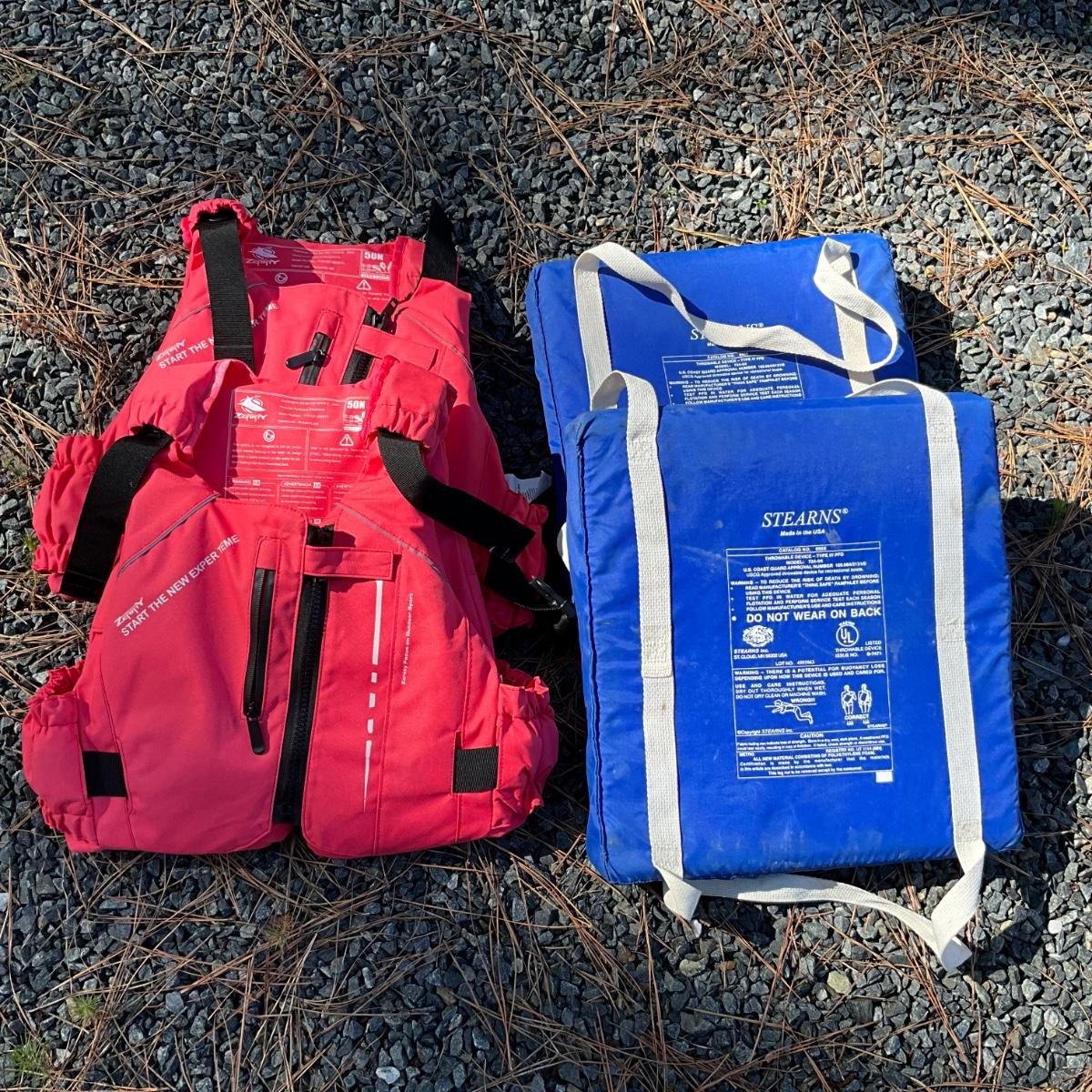 S1676 Two XL Zeratty and Two STEARNS Life Preservers | EstateSales.org