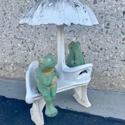 Pair of Frogs Sitting on a Bench Under Umbrella Concrete Garden Yard ...