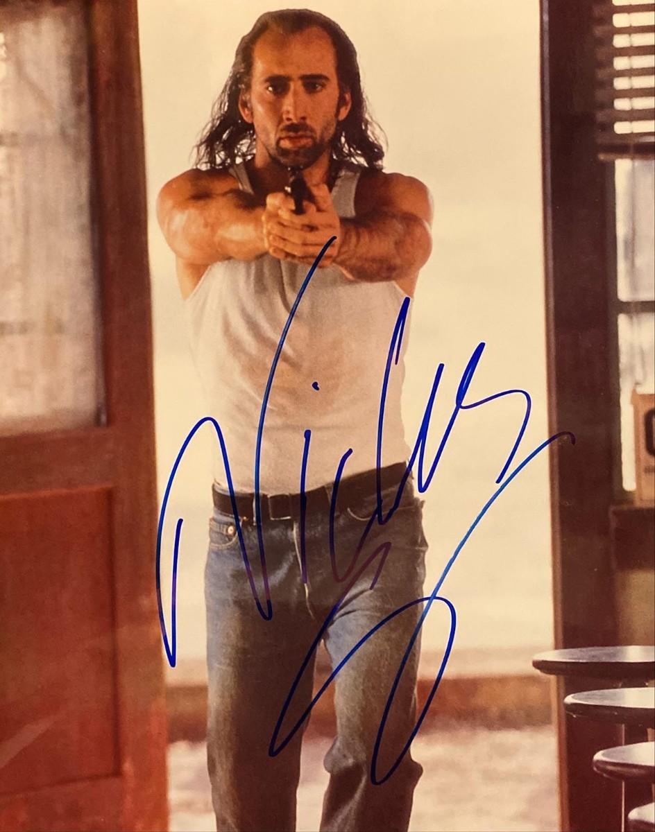 Nicolas Cage signed movie photo | EstateSales.org