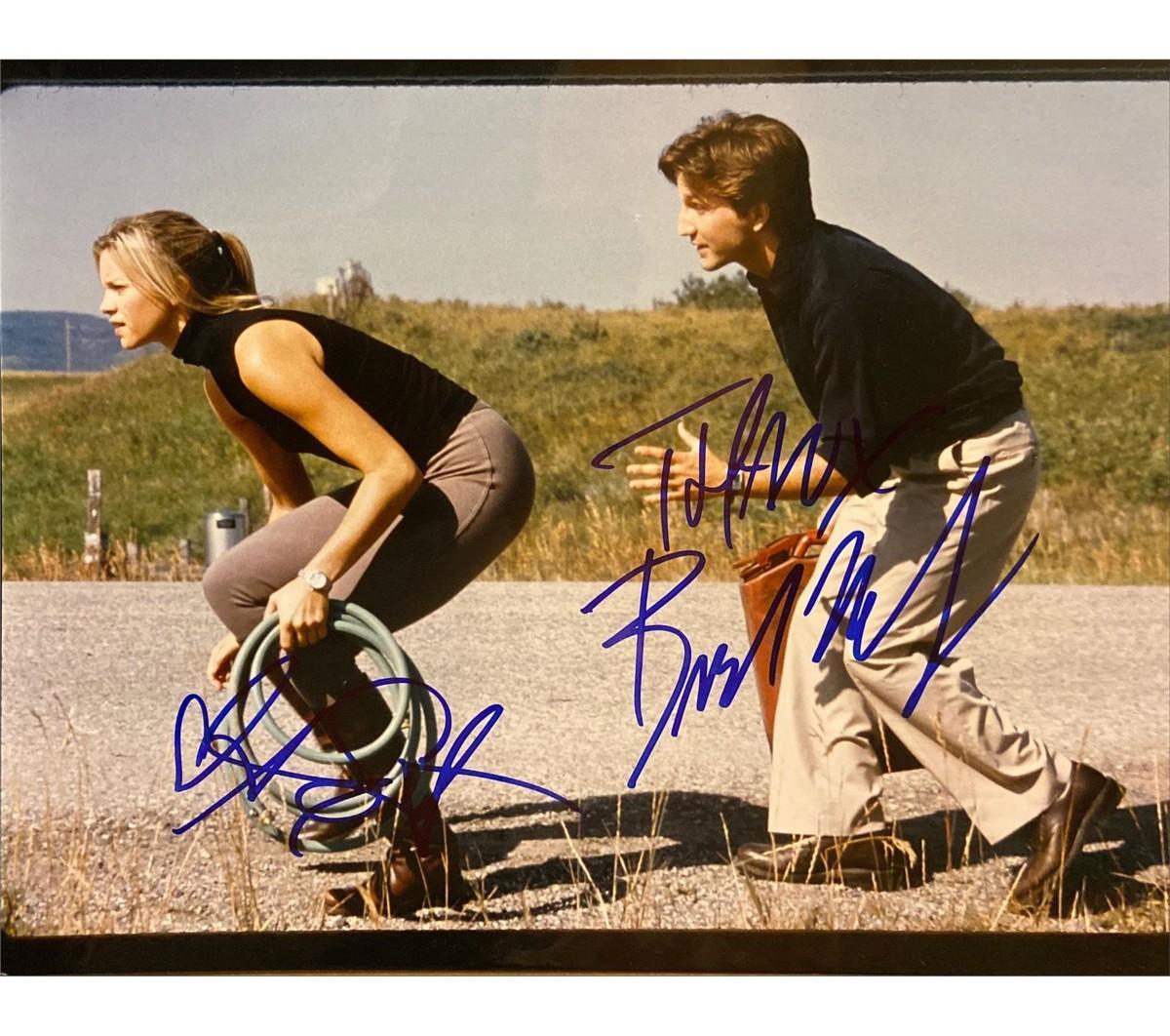 Rat Race Amy Smart and Breckin Meyer signed movie photo | EstateSales.org