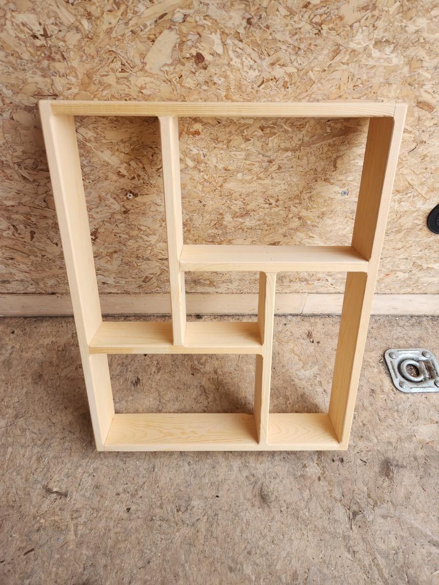 Wooden display shelf | EstateSales.org