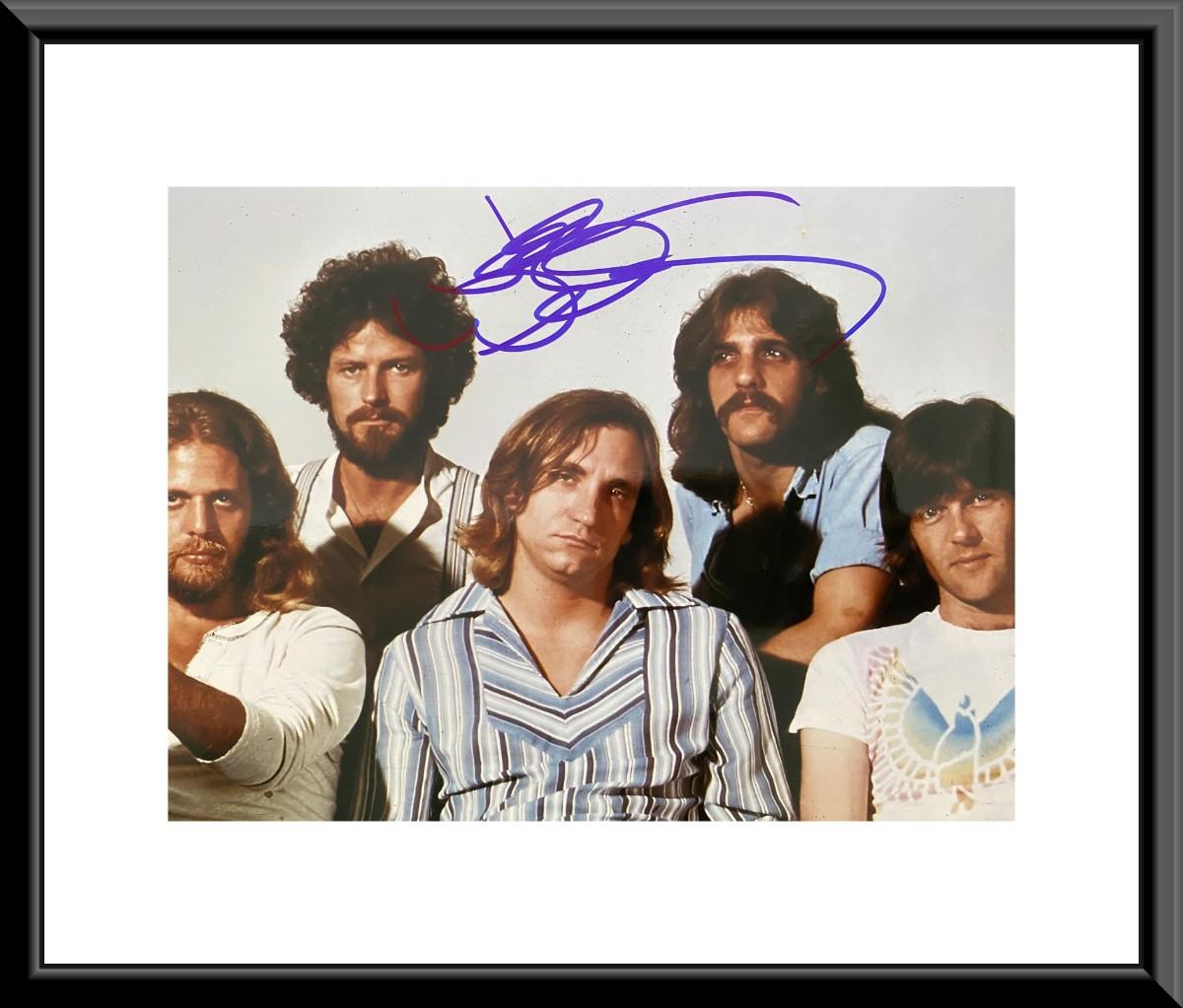 The Eagles Joe Walsh signed photo | EstateSales.org