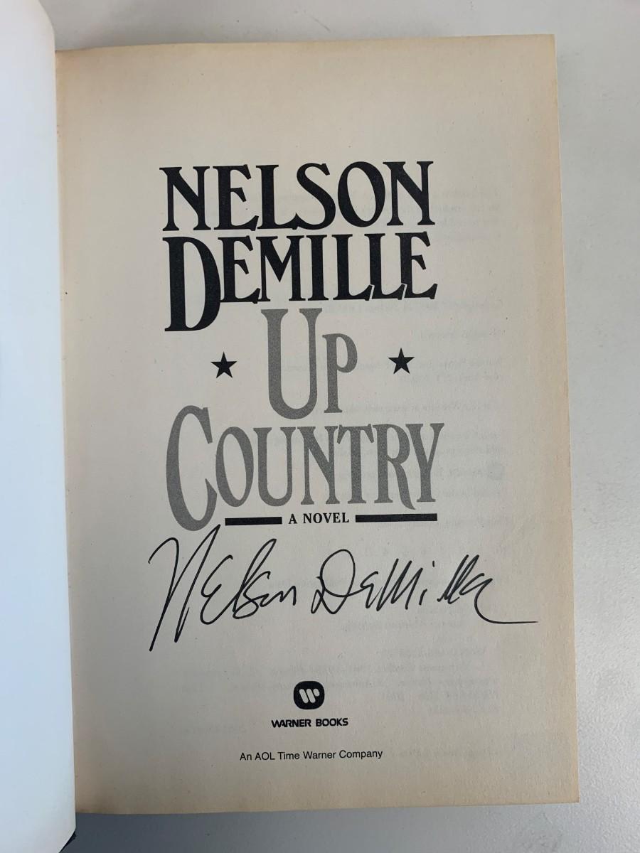 Up Country Nelson DeMille signed first edition book | EstateSales.org