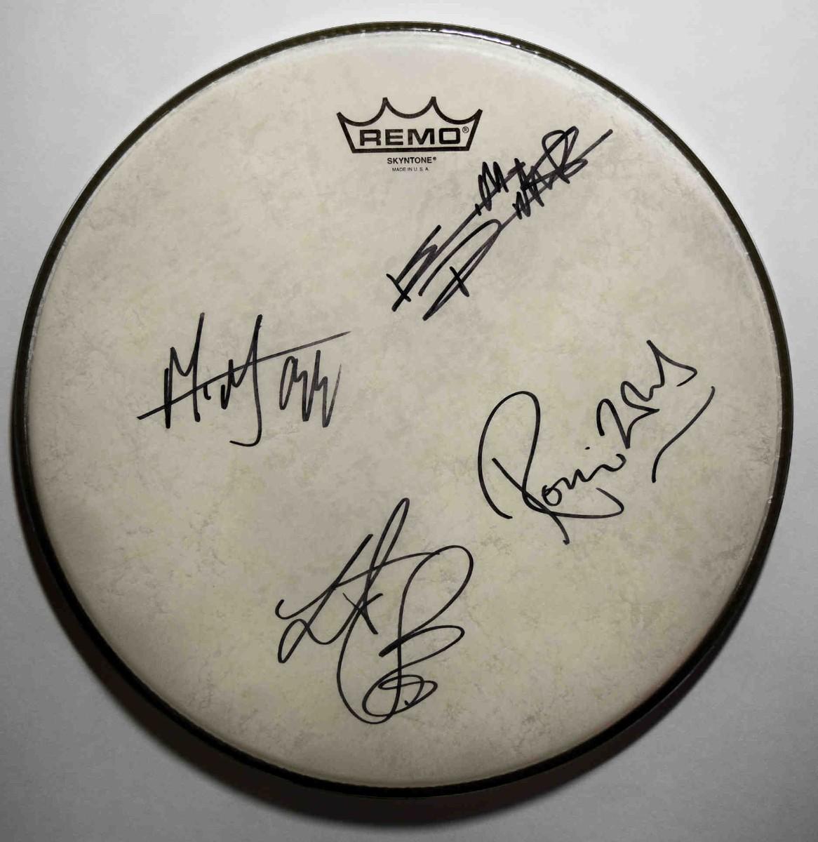 The Rolling Stones signed drum head | EstateSales.org