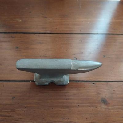 GOOFY CLAY FIGURES AND A MINIATURE LEAD ANVIL | EstateSales.org