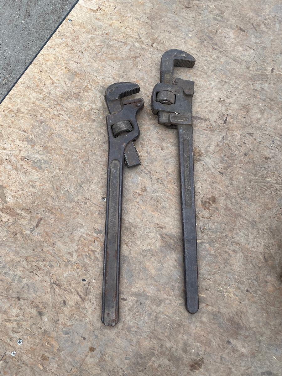 2 very large pipe wrenches | EstateSales.org