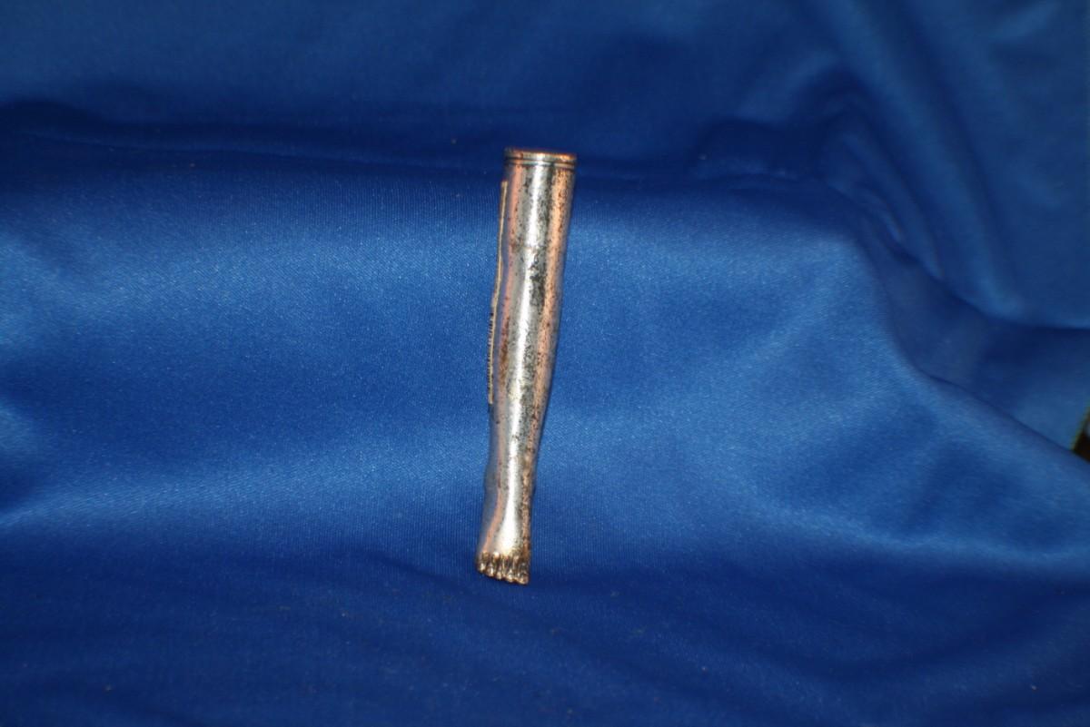 Silver Leg Lighter | EstateSales.org