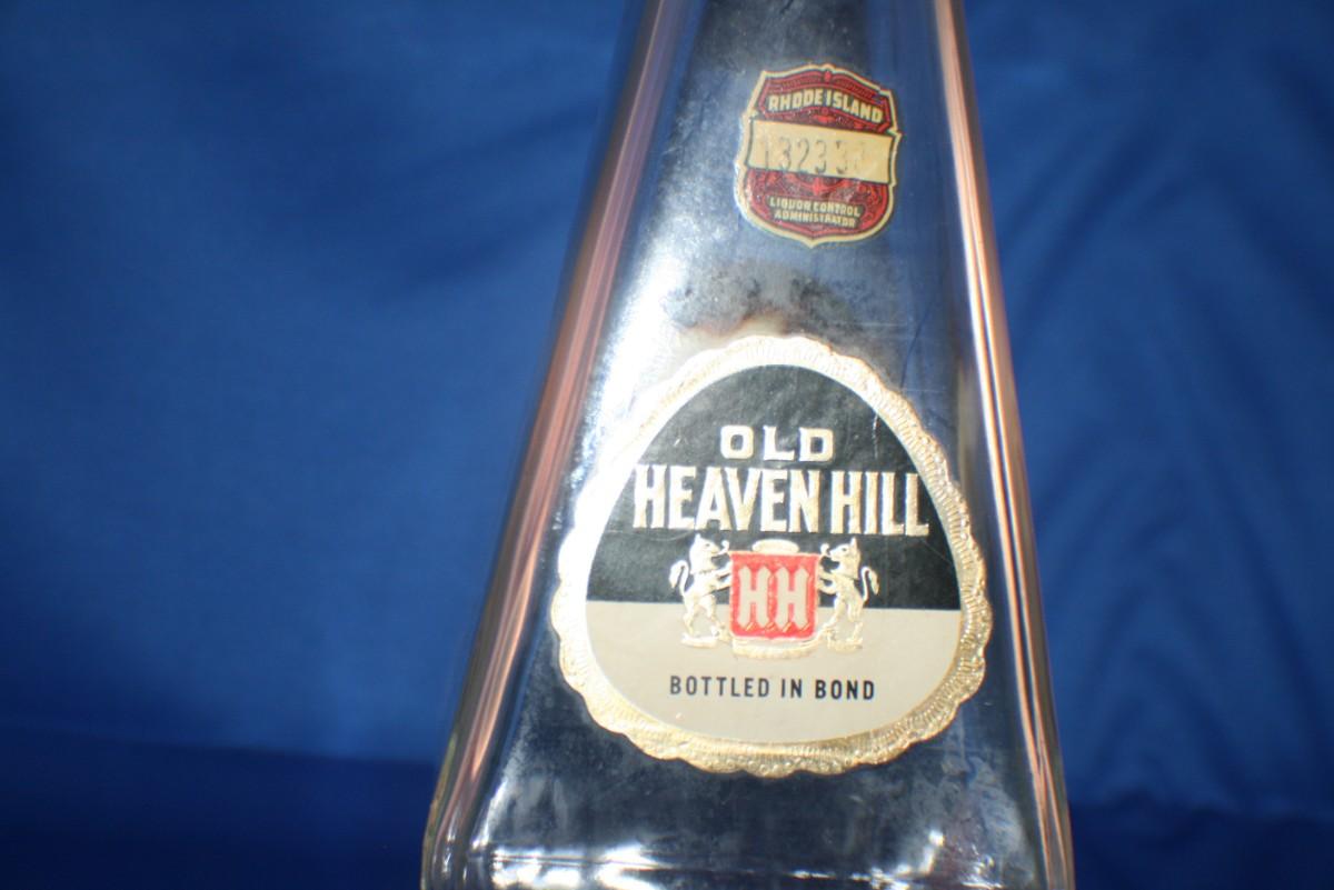 Clear Glass Old Heaven Hill Liquor Bottle | EstateSales.org