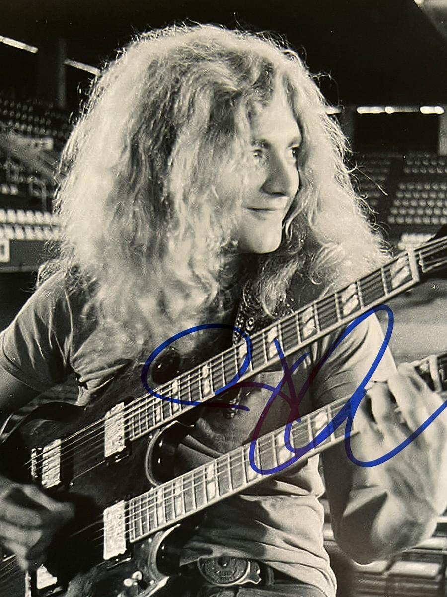 Led Zeppelin Robert Plant signed photo | EstateSales.org