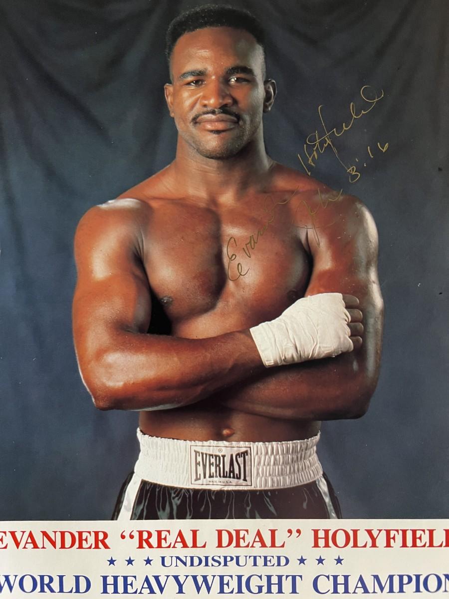 Evander Hollyfield signed photo | EstateSales.org