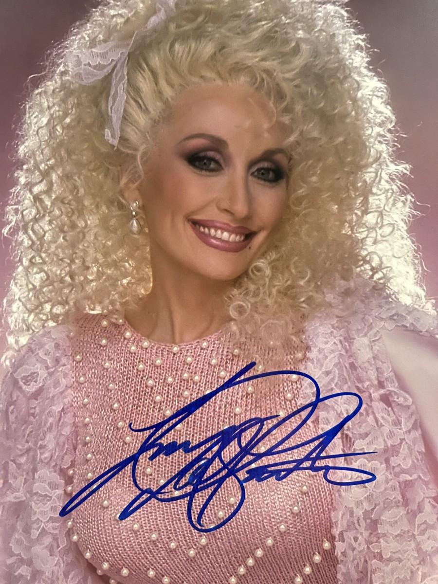 Dolly Parton signed photo | EstateSales.org