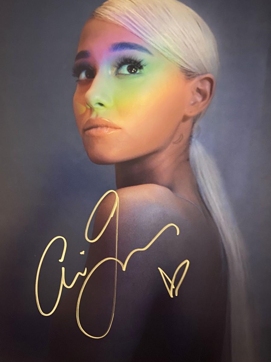 Ariana Grande signed photo | EstateSales.org