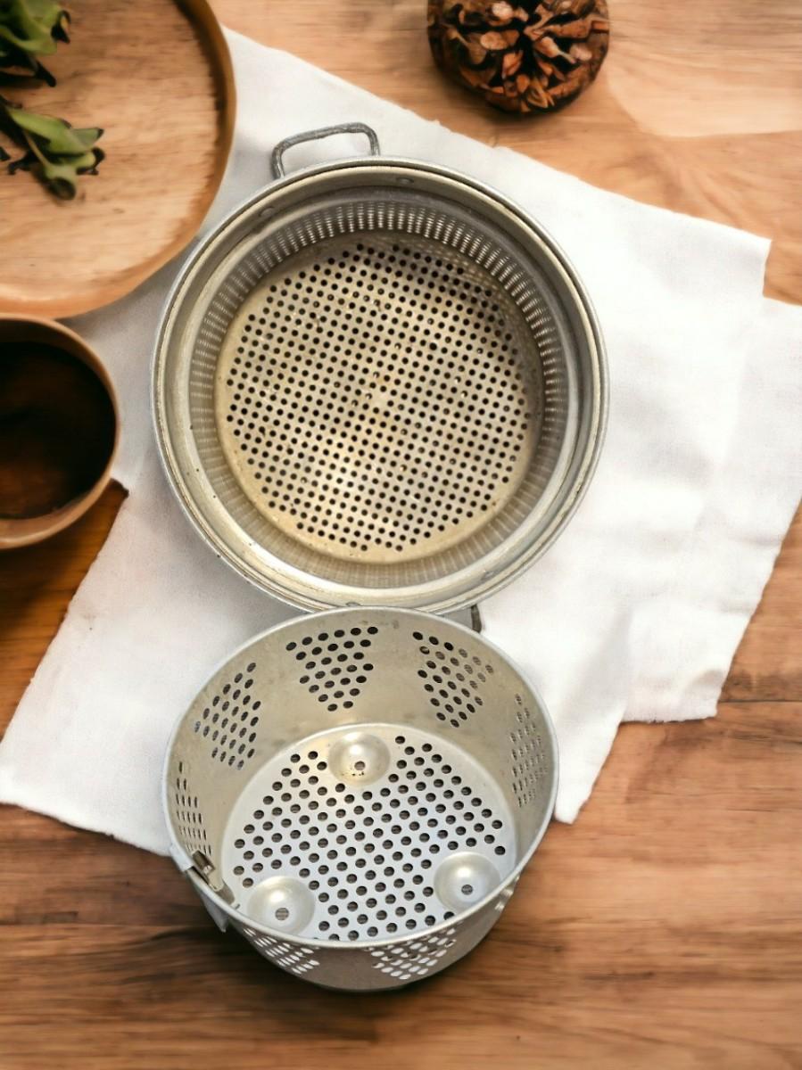 Vintage metal stainer lot | EstateSales.org