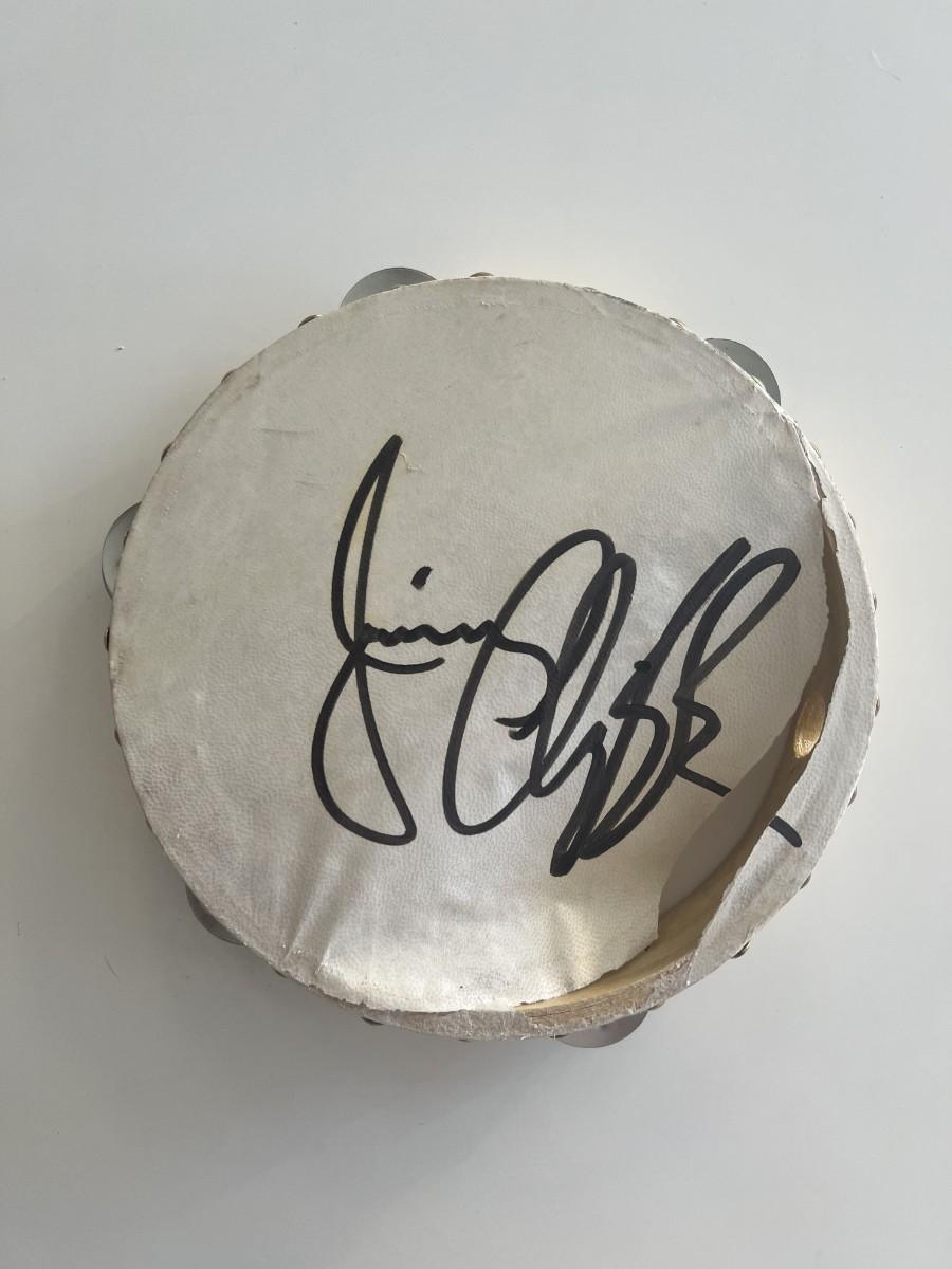 Jimmy Cliff signed tambourine | EstateSales.org